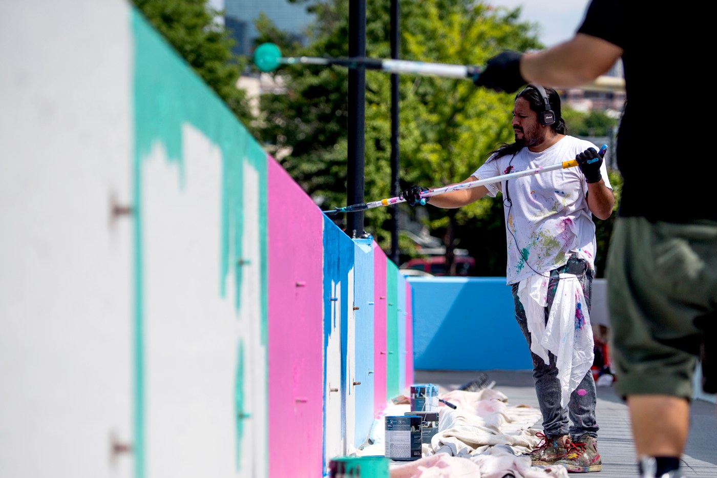 An artist ramps up his striking mural at Northeastern’s Boston campus ...