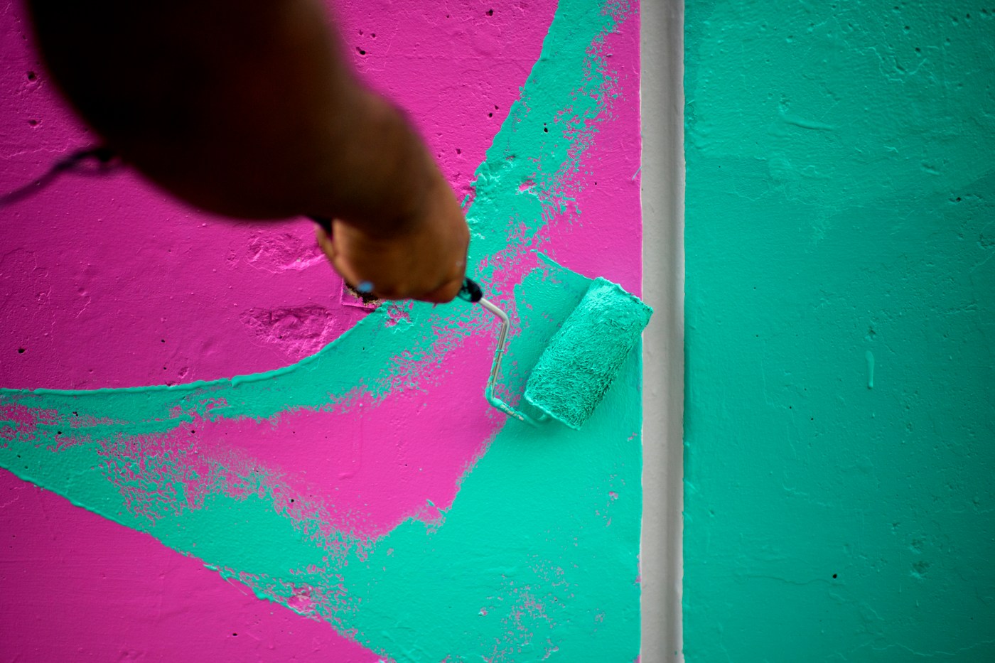 An artist ramps up his striking mural at Northeastern’s Boston campus ...