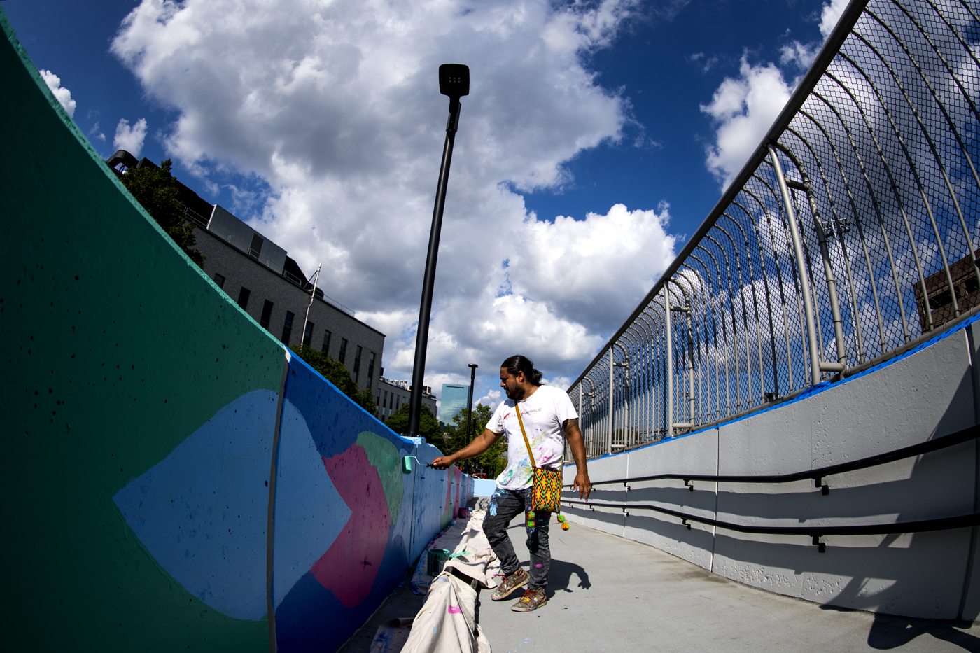 An artist ramps up his striking mural at Northeastern’s Boston campus ...