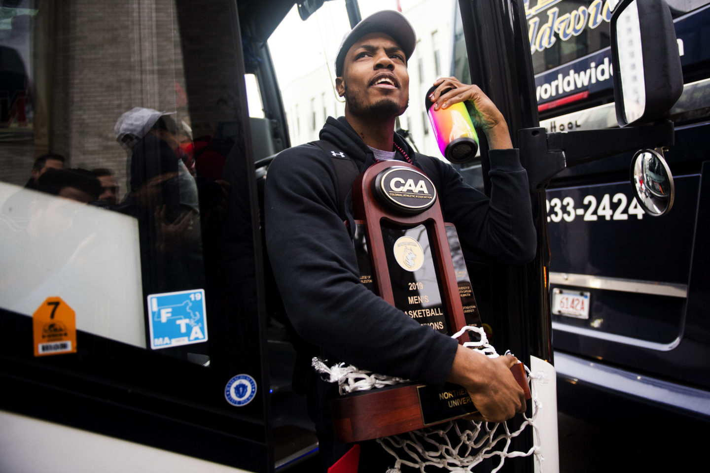 Fans cheer Northeastern men’s basketball team as it returns to Boston ...