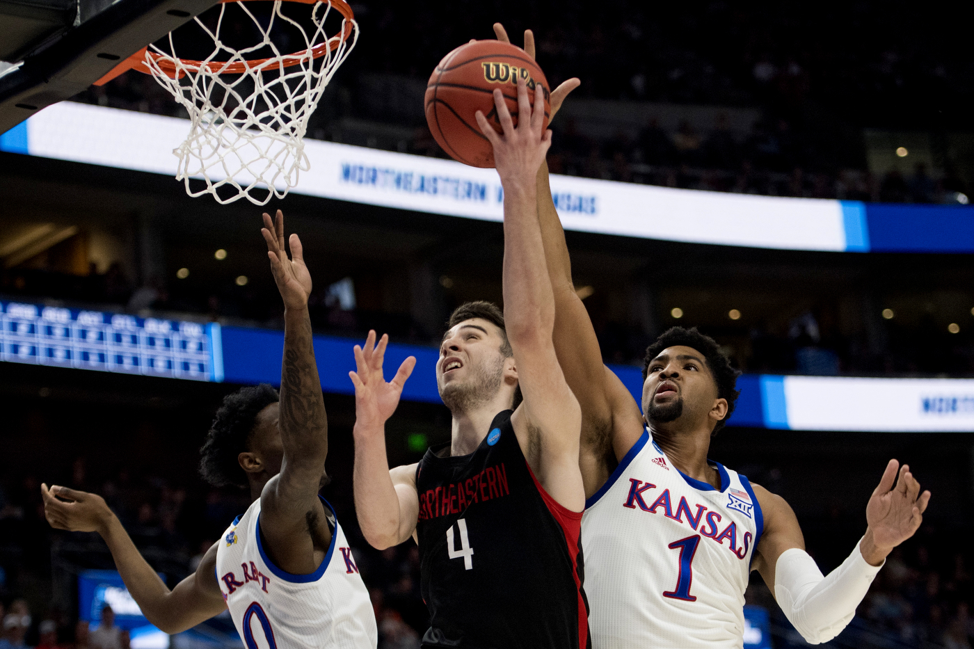 Northeastern Huskies fall short in NCAA first-round loss to Kansas ...