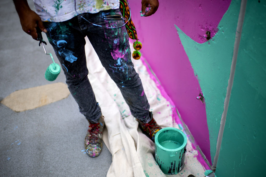 An artist ramps up his striking mural at Northeastern’s Boston campus ...