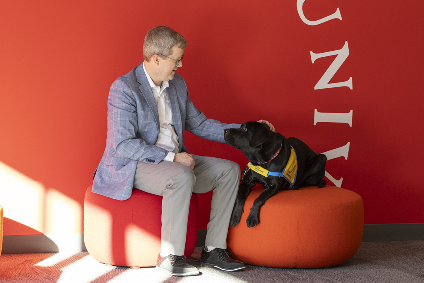 Dean Thurman’s Service Dogs Bring Comfort to Seattle Campus