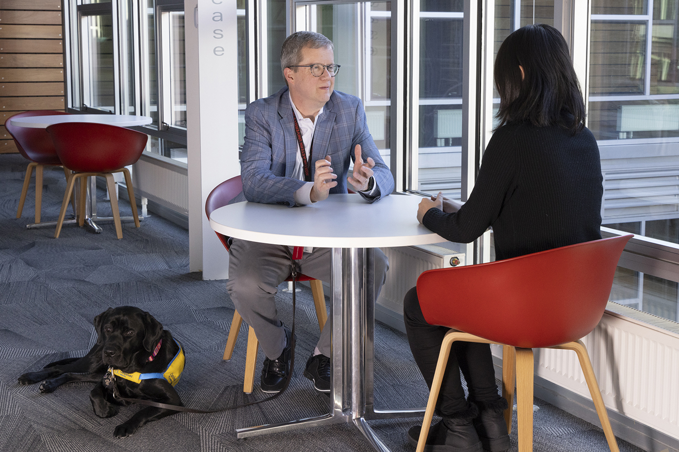 Dean Thurman’s Service Dogs Bring Comfort to Seattle Campus