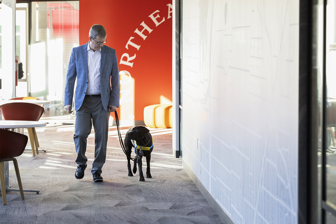 Dean Thurman’s Service Dogs Bring Comfort to Seattle Campus